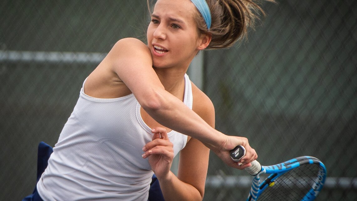 Rogers’ Madison Egan thrives in tennis, cross country, basketball ...